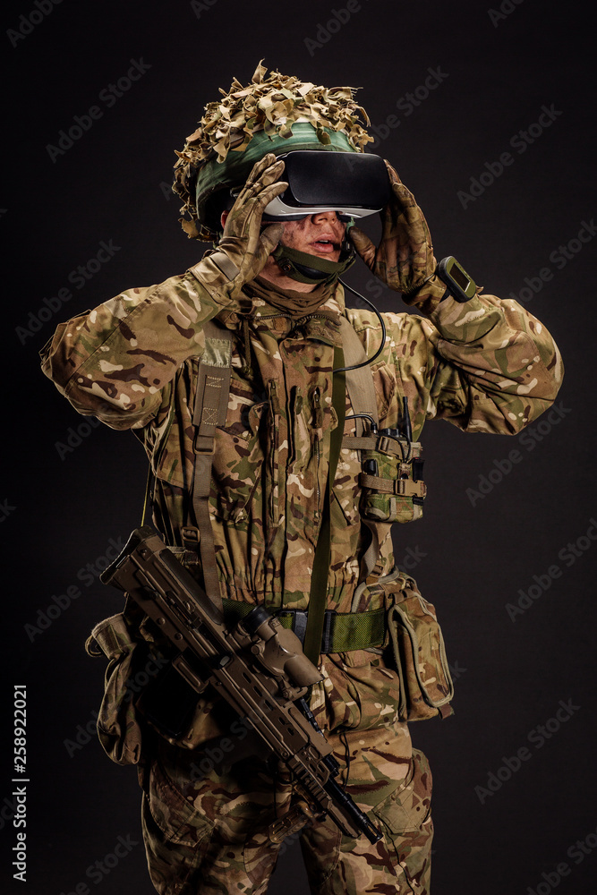 soldier use a VR glasses for combat simulation training Stock Photo ...