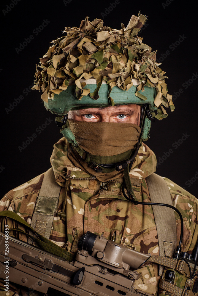 British special forces soldier with weapon take part in military ...