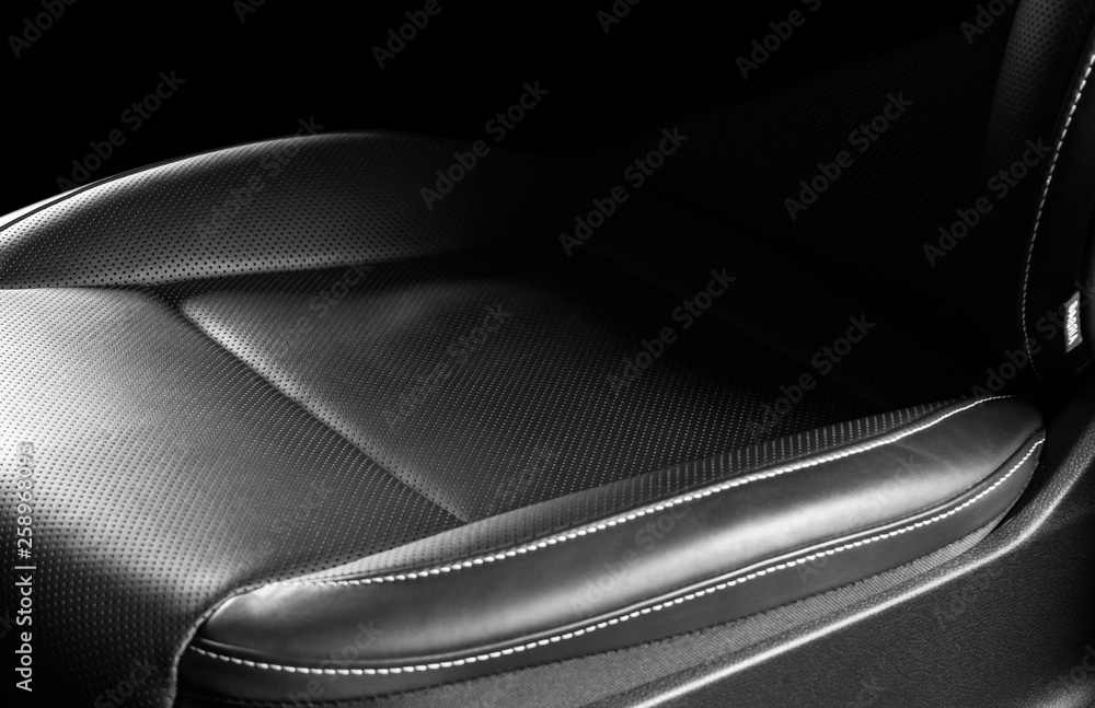 Modern luxury car leather interior. Part of leather car seat details ...