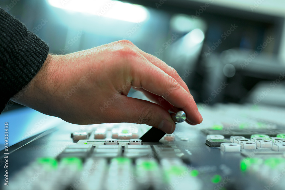 Controlled in a broadcast studio Stock Photo | Adobe Stock