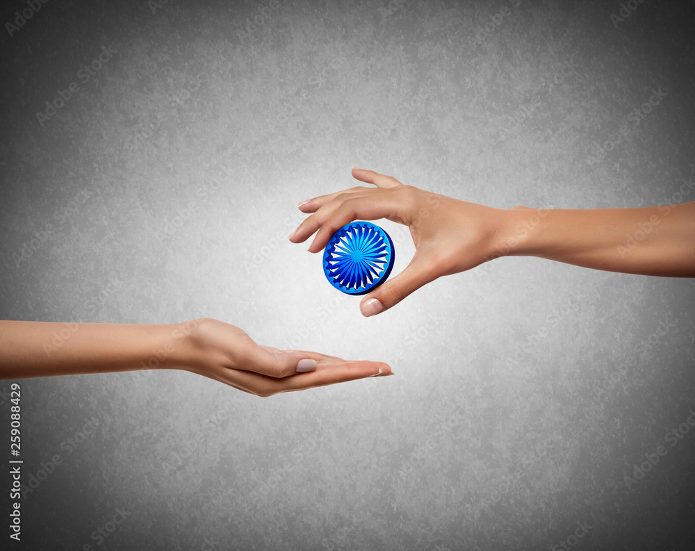 Ashoka chakra holding by hands - Image Stock Photo | Adobe Stock