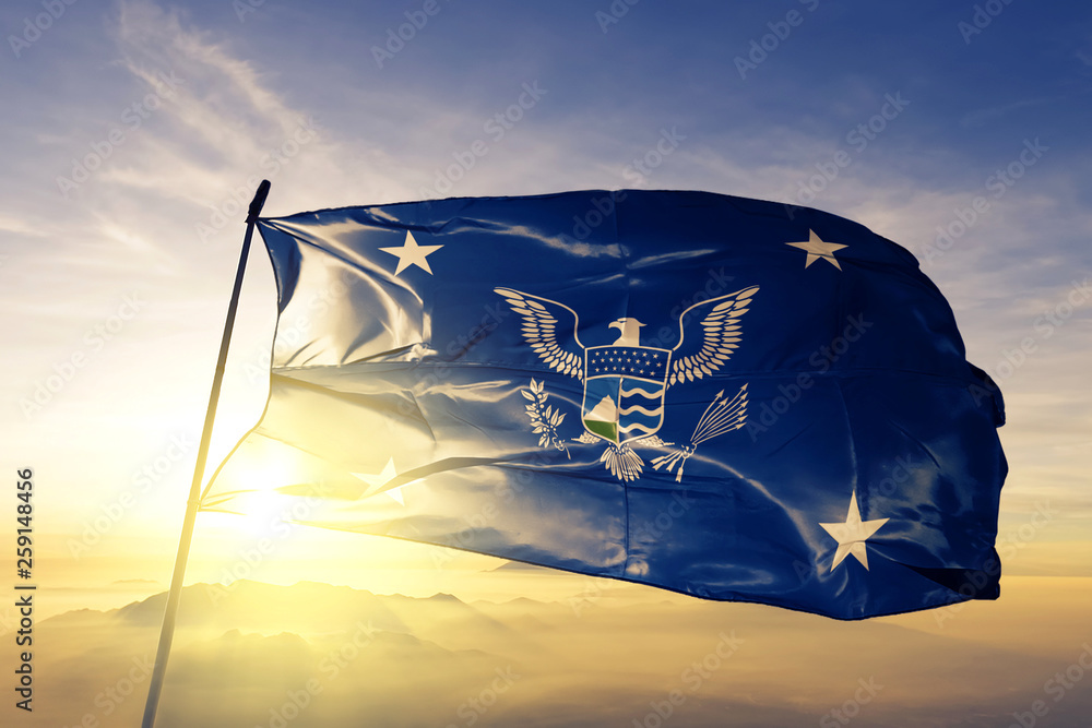 United States Secretary of Homeland Security flag waving sunrise mist ...