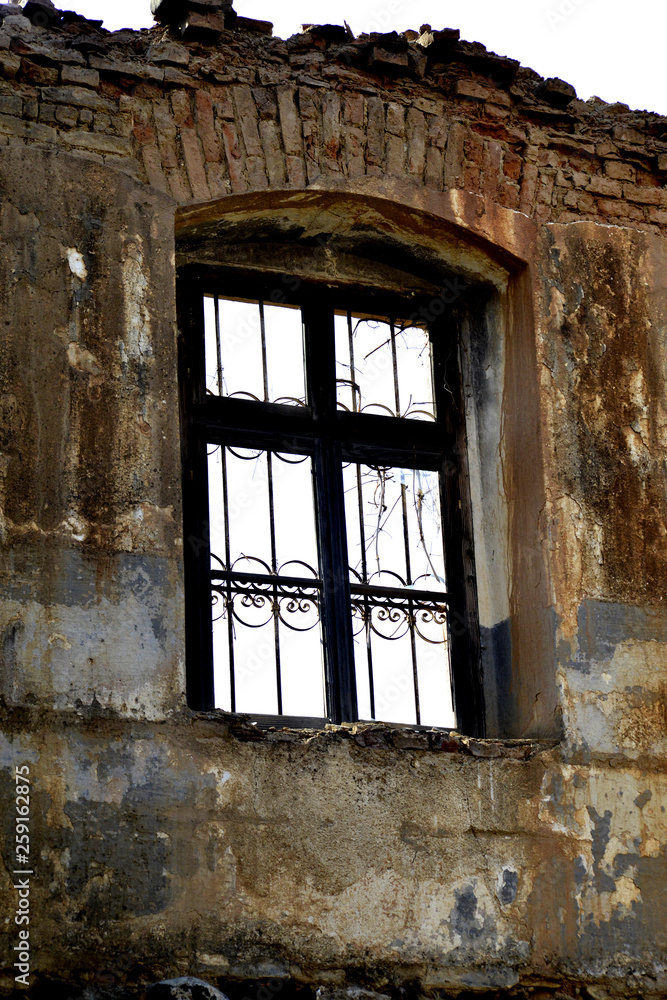 window of a ruin of an old abandoned building in village of ljubojno in ...
