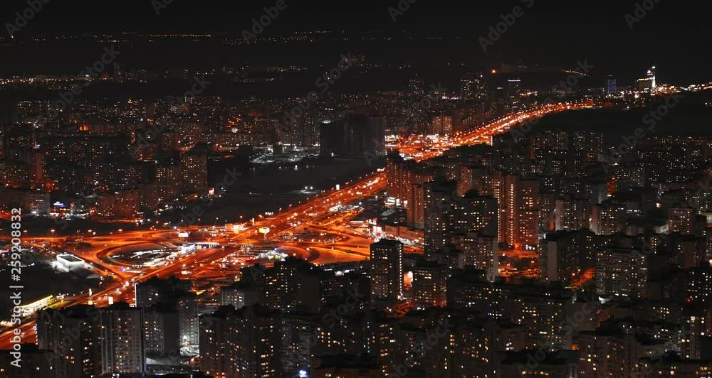 Drone shot over megapolis after sunset. Night lights of the big city ...