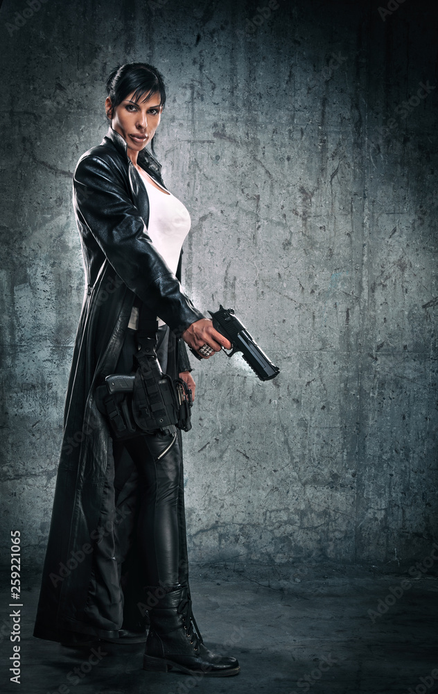 Dangerous Woman With Guns - Female Action Hero Stock Photo | Adobe Stock