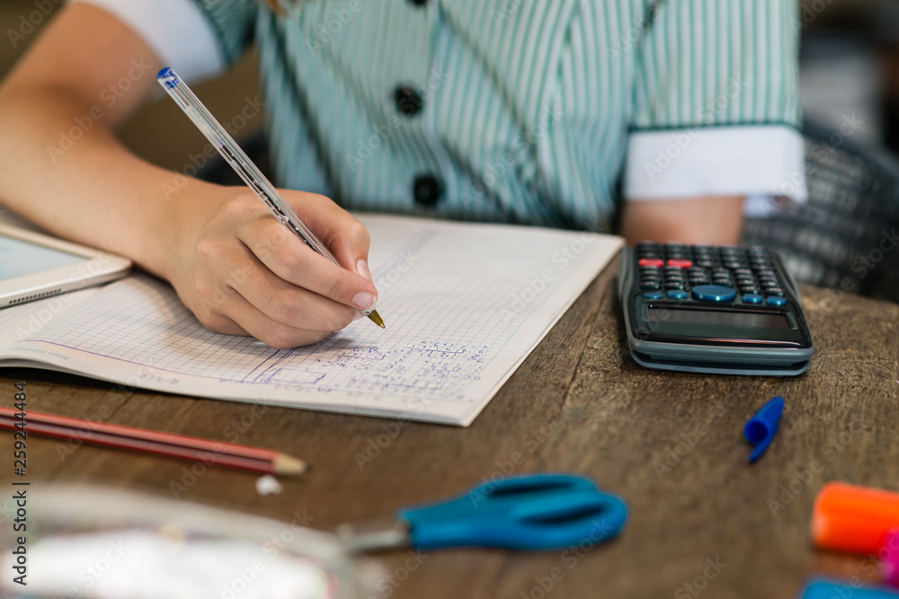 high school student doing maths homework Stock Photo | Adobe Stock