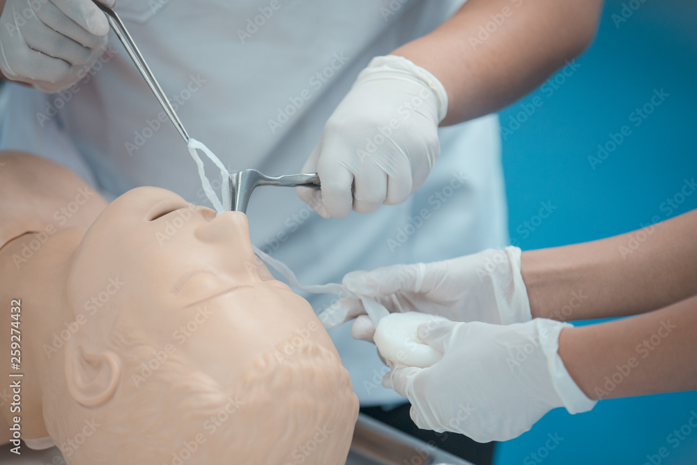 Medical students are using two medical tools to model the nasal cavity ...