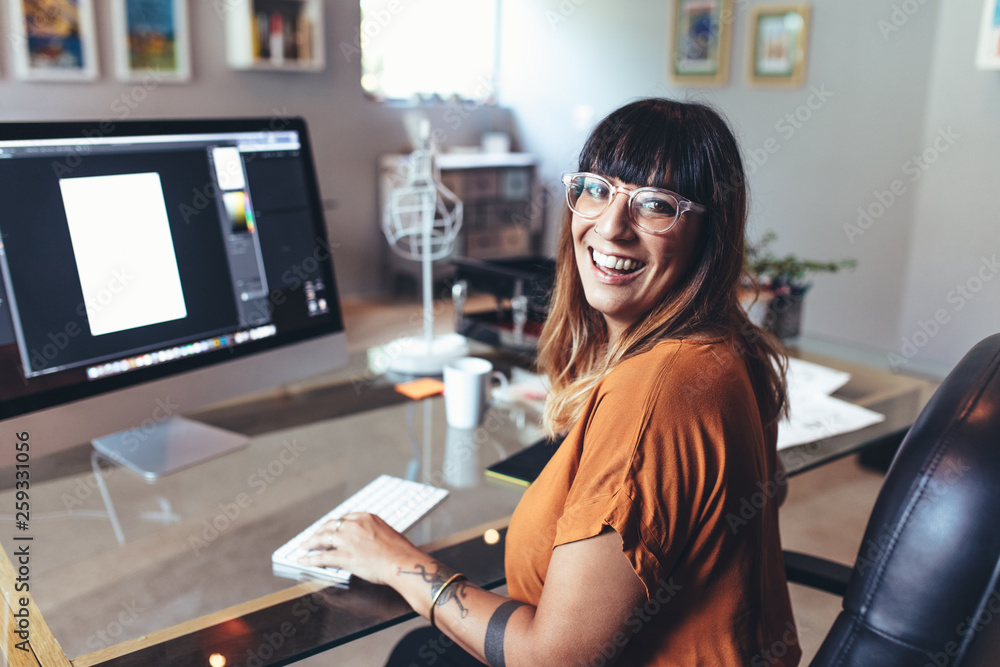 Illustrator working on computer at office Stock Photo | Adobe Stock