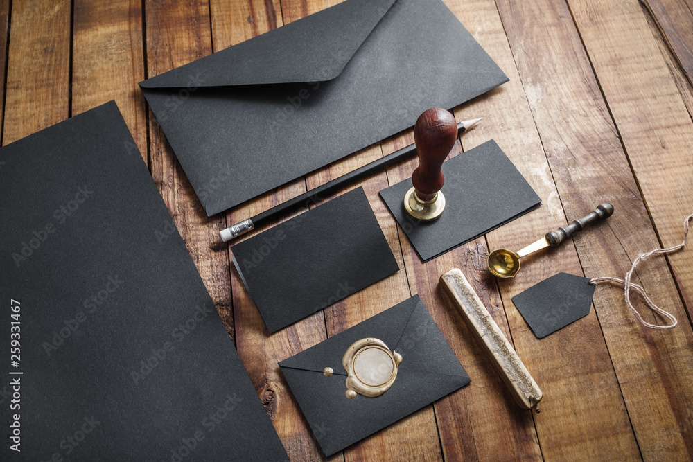 Blank retro stationery on vintage wood table background. Mockup for ...