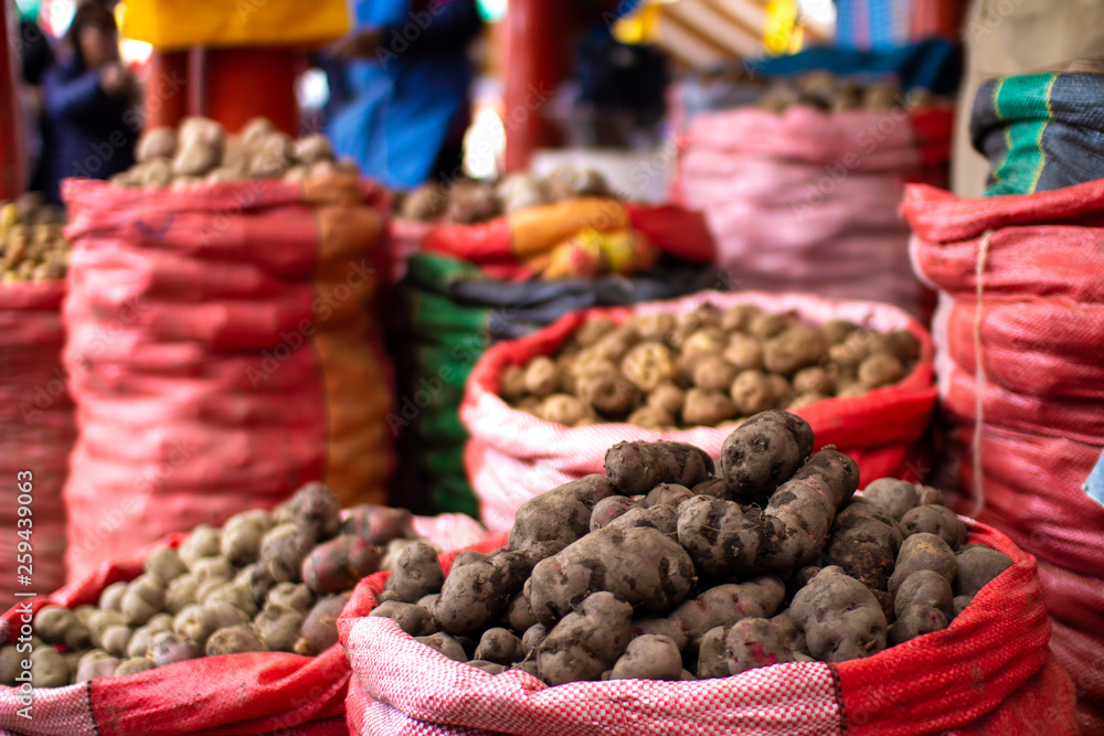 Different types and varieties of Peruvian organic potatoes in sacks at ...