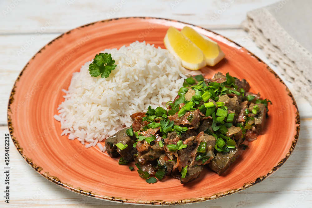 Braised liver with chorizo sausage. Stock Photo | Adobe Stock