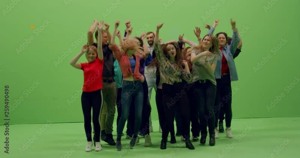 GREEN SCREEN CHROMA KEY Front view group of young people dancing and ...