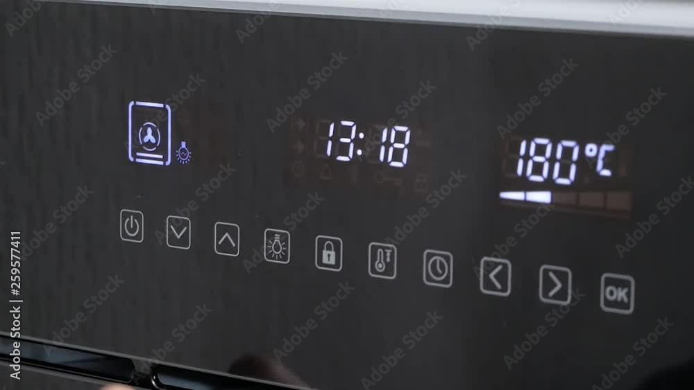 Vidéo Stock Front panel of modern black electric oven whith touch ...