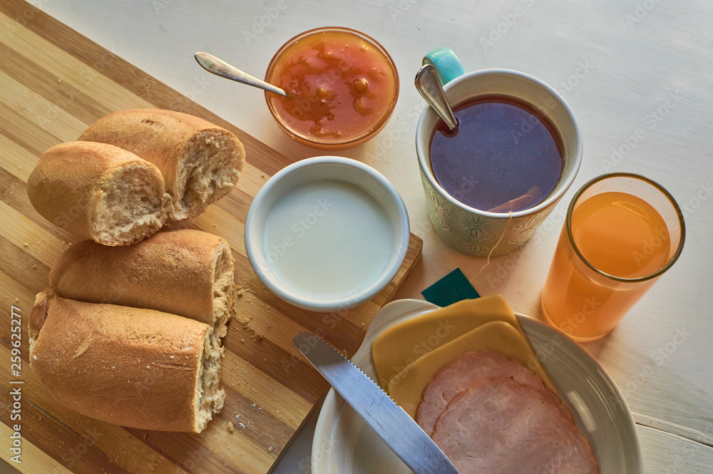 te con pan chileno y queso con jamón y mermelada Stock Photo | Adobe Stock