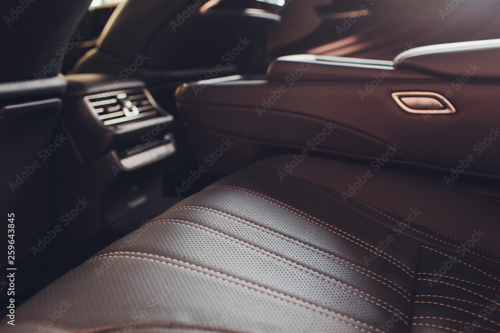 Luxury car inside. Interior of prestige modern car. Comfortable leather ...