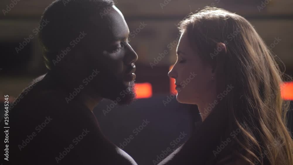 Closeup Of African American Male Holding Pulling Womans Hair And Covering Her Neck With Kisses
