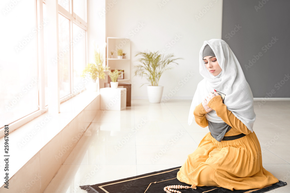 Muslim Woman Praying At Home
