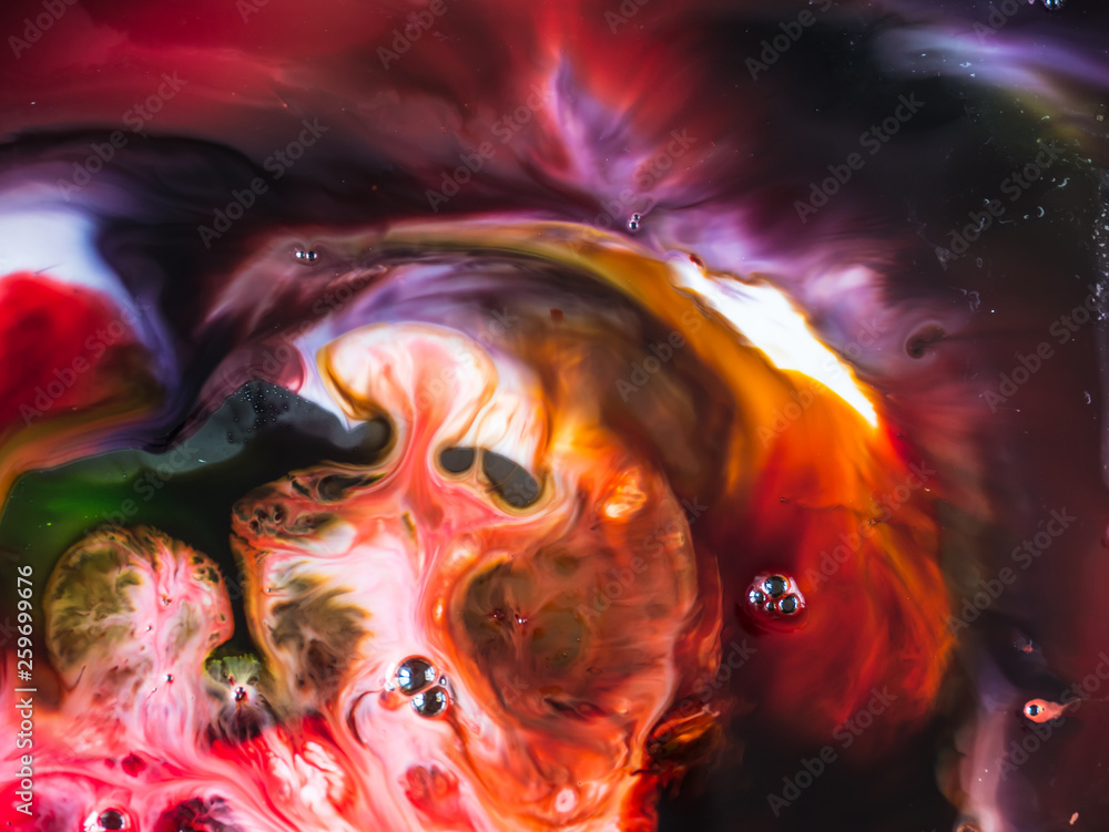 Abstract background, various pigments and dyes create a rich texture ...