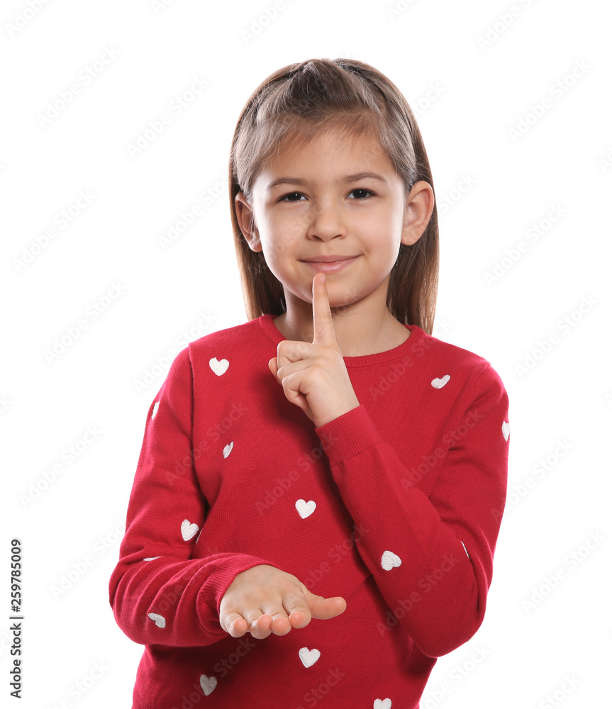 Little girl showing HUSH gesture in sign language on white background ...