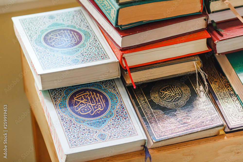 religious Islamic book Quran in the library of the mosque Stock Photo ...