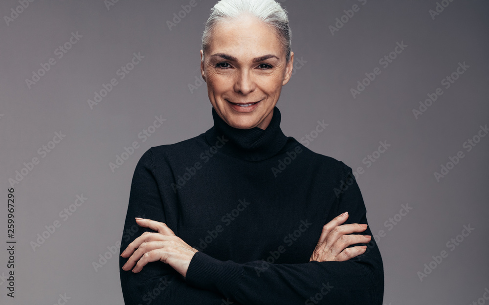 Confident mature woman in casuals Stock Photo | Adobe Stock