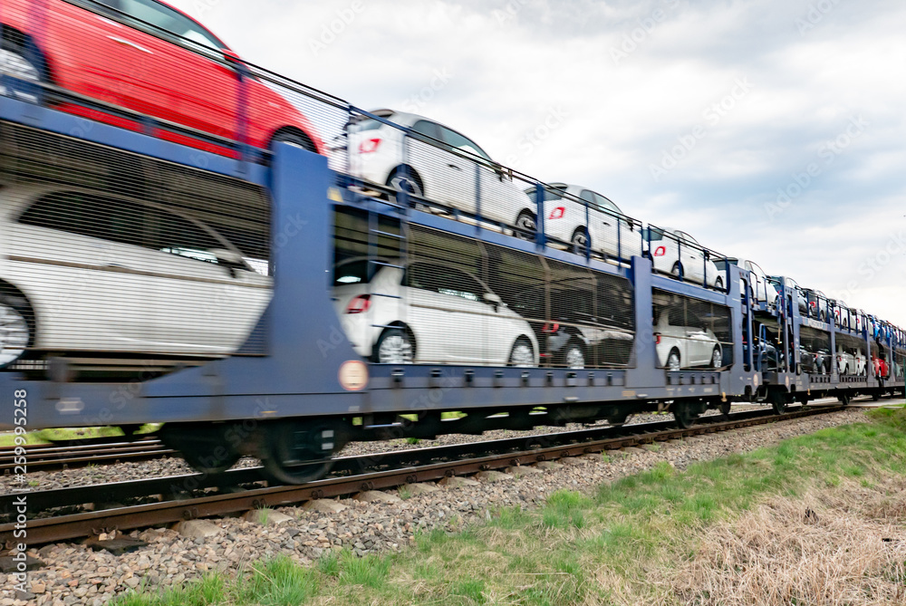 Railroad transport of the newly manufactured cars from factory Stock ...