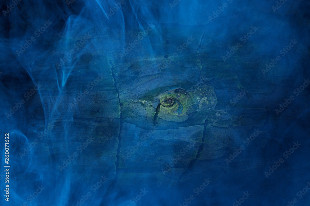 charming wooden texture with beautiful patterns hidden under the blue ...