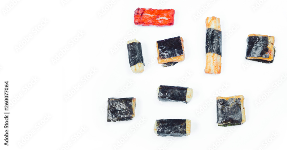 Mix of Asian snack on white background. Japanese nori maki arare rice ...