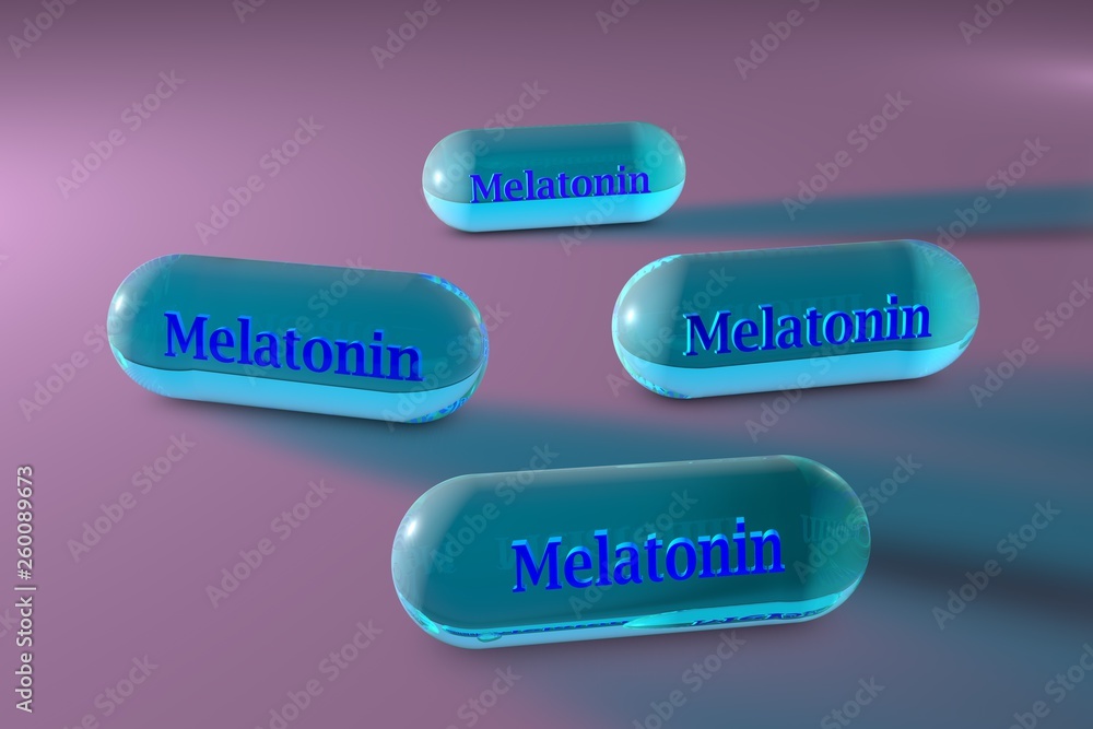 Blue melatonin capsules. Melatonin is a hormone that produces by pineal ...