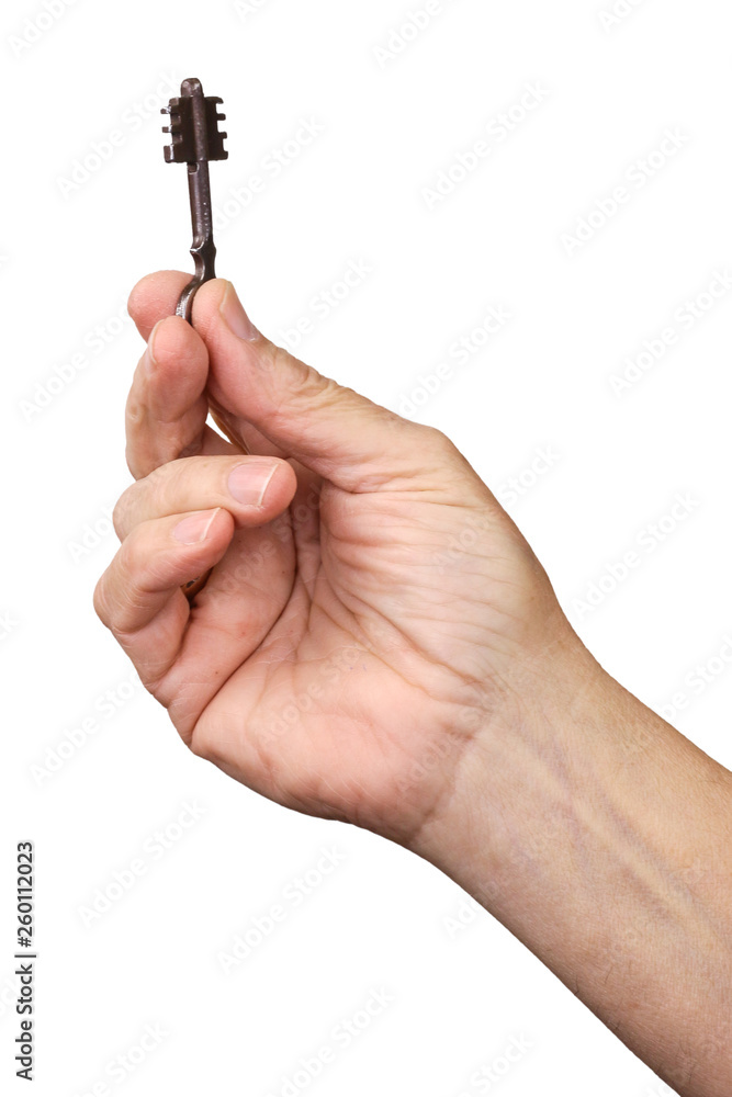 Old man holding key. Aged man hand with key. Old man hand isolated on ...