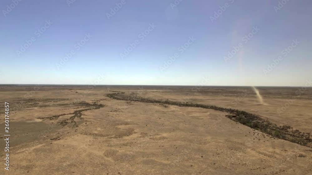 A Dust Devil whirls through the Australian outback with a birds eye ...