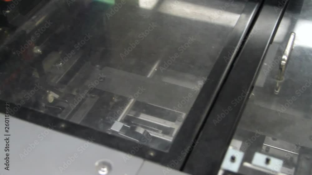 Automated stapling or binding process at a printing press Stock Video ...