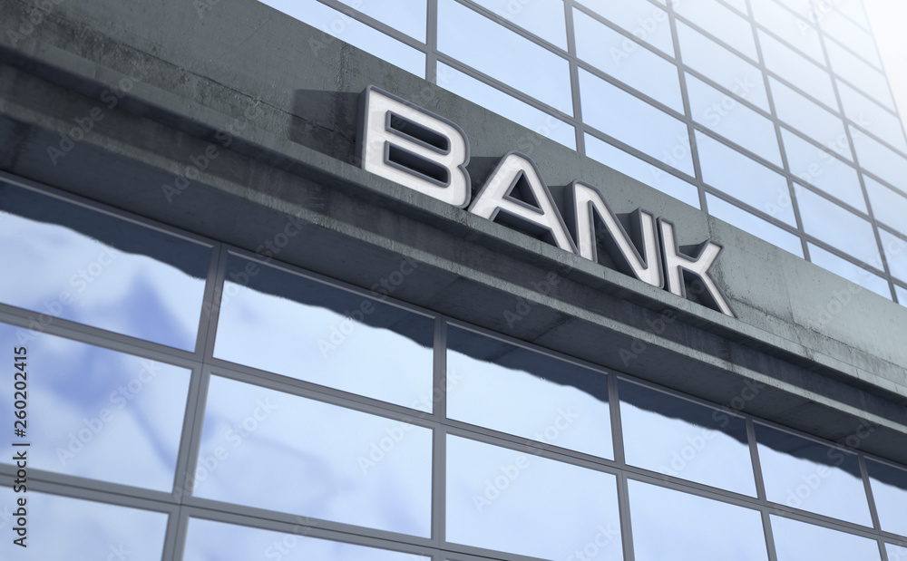 Signage above the entrance to a modern generic bank building made of ...