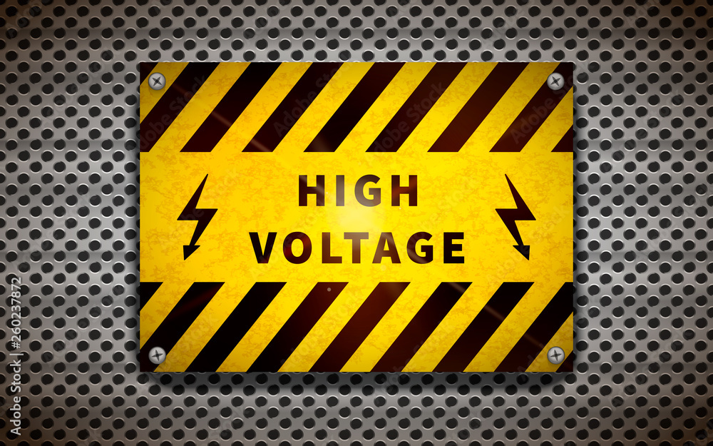 Yellow high voltage sign on metallic grid, industrial background Stock ...