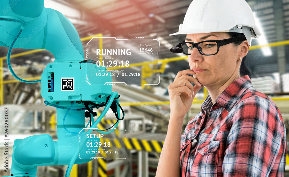 Virtual Augmented reality technology in industry 4.0. Engineer woman ...