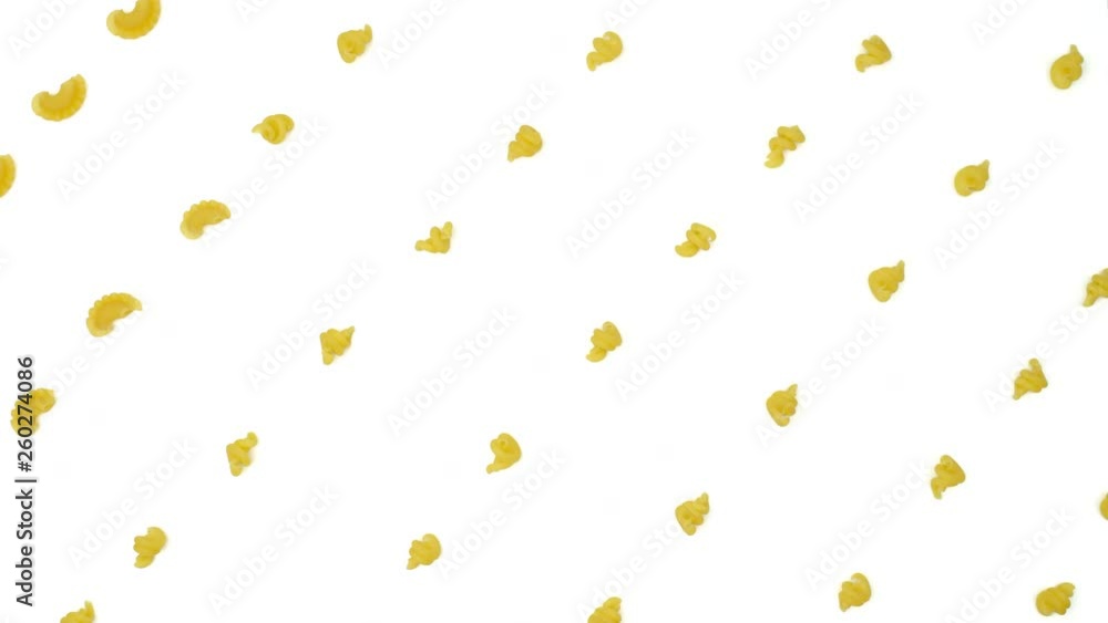 Top view on different shapes of pasta changing on white background ...