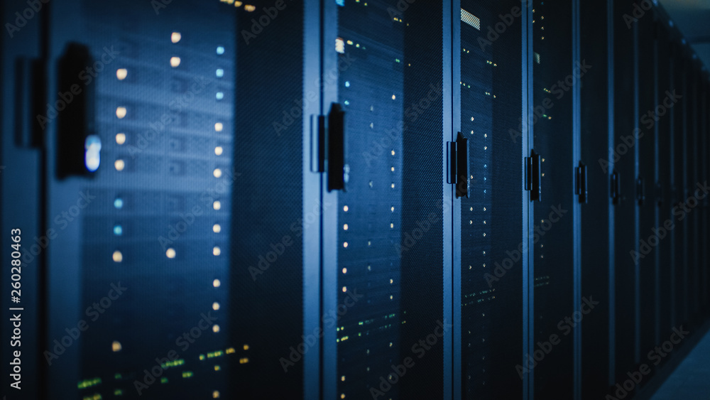 Shot of Dark Modern Data Center With Row of Fully Operational Server ...