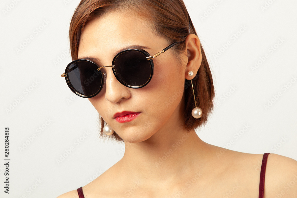 Chinese Girl wearing varies types of fashion sunglasses,looking sharp ...