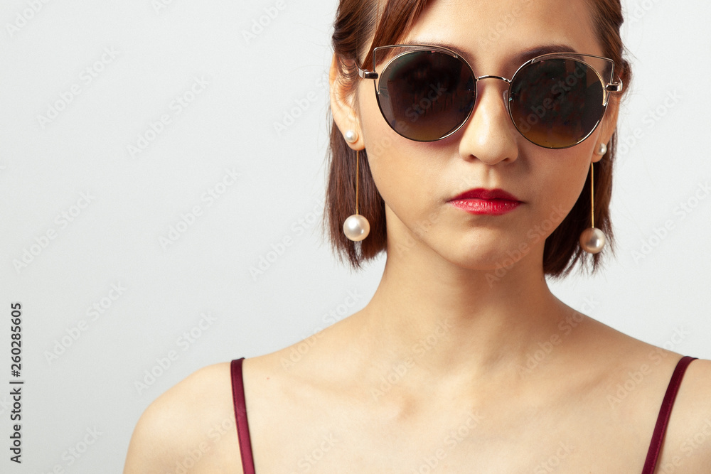 Chinese Girl wearing varies types of fashion sunglasses,looking sharp ...