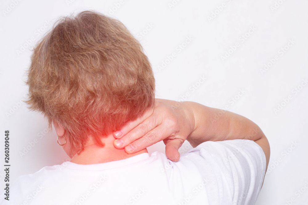 Elderly woman holding her neck behind the concept of pain in the neck ...