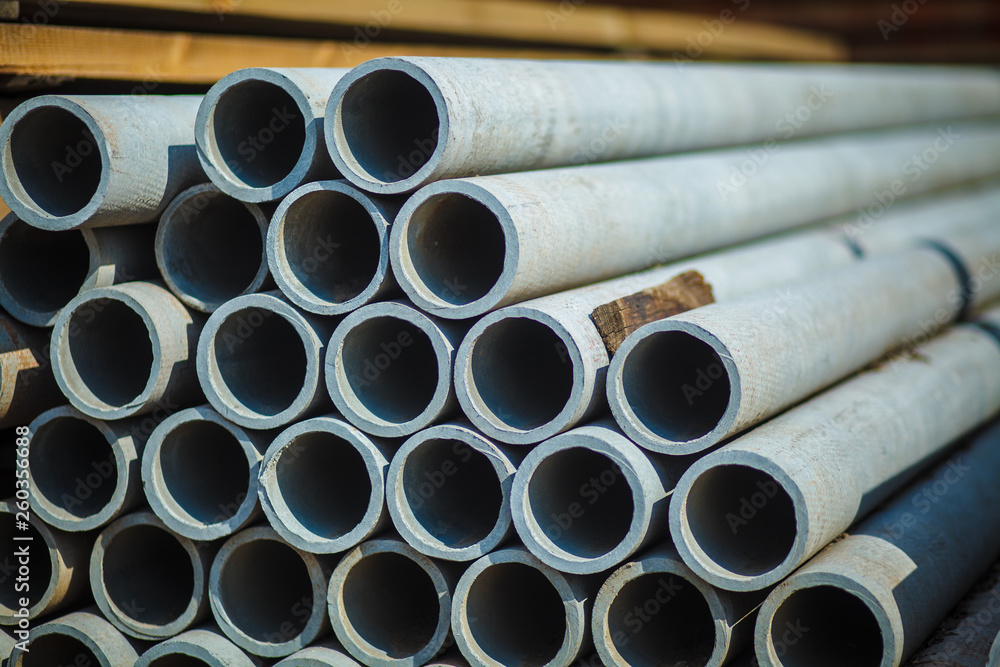 Asbestos Concrete Pipe Stacked For use in construction. In the drainage ...