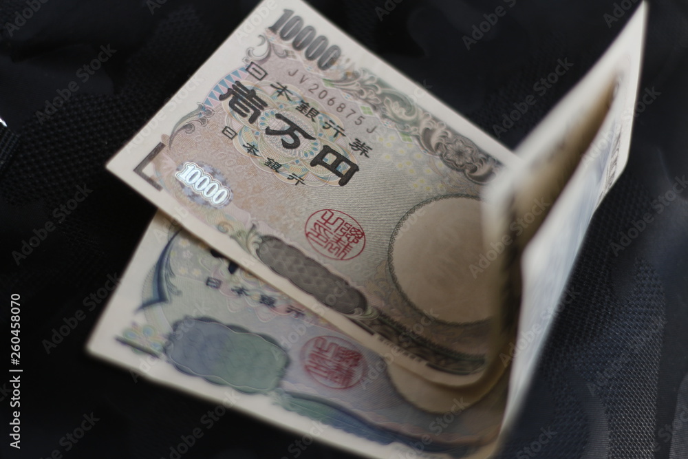 Ten thousand yen bills and thousand yen bills. Japanese money and ...