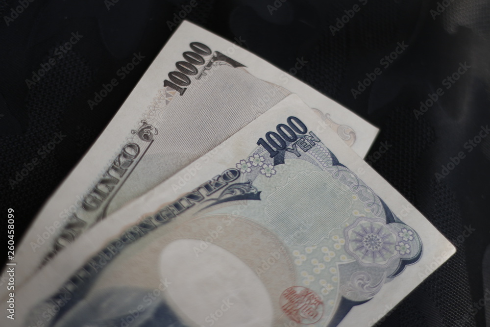 Ten thousand yen bills and thousand yen bills. Japanese money and ...
