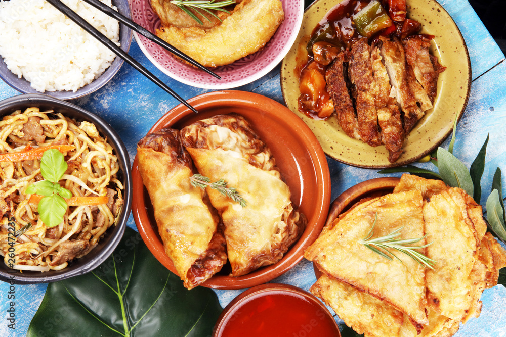 Assorted Chinese food set. Chinese noodles, fried rice, peking duck ...