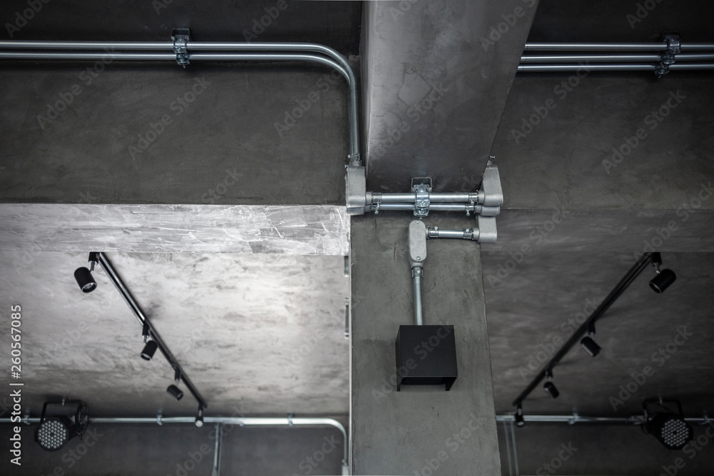 wiring in the building on ceiling and electrical conduits system and ...