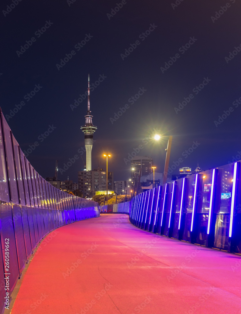 Auckland, New Zealand - 8 January 2019: pink cyclepath in Nelson street ...