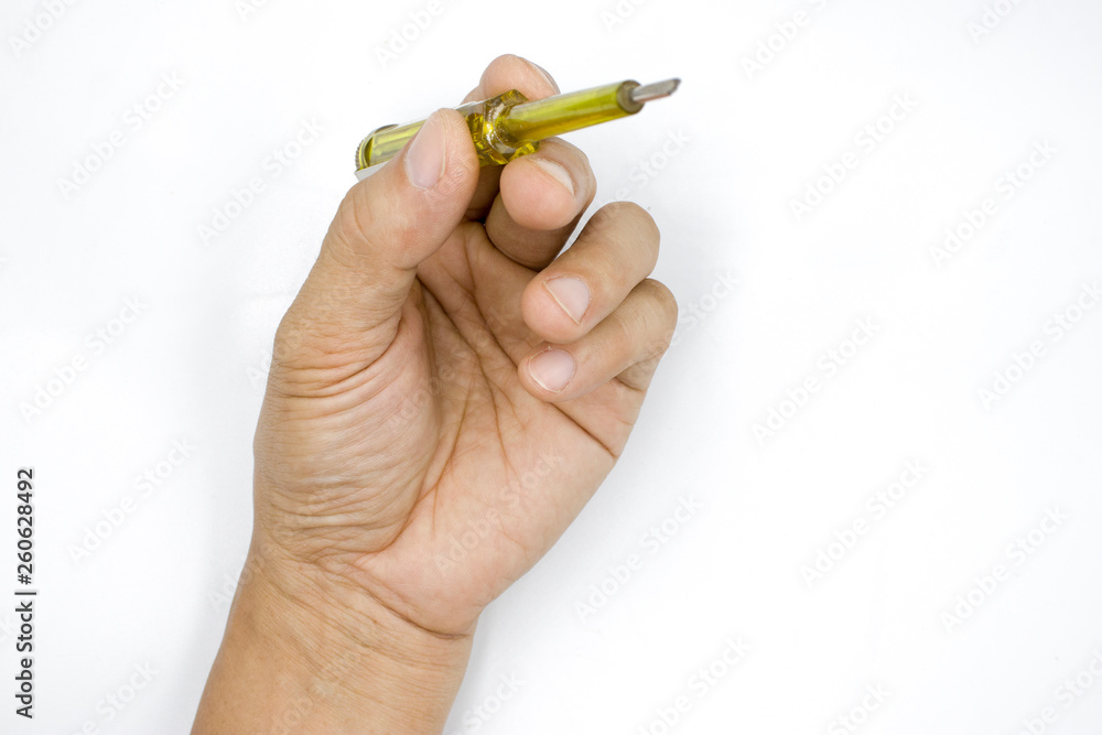 Male hand holding electric tester screwdriver to check the electrical ...