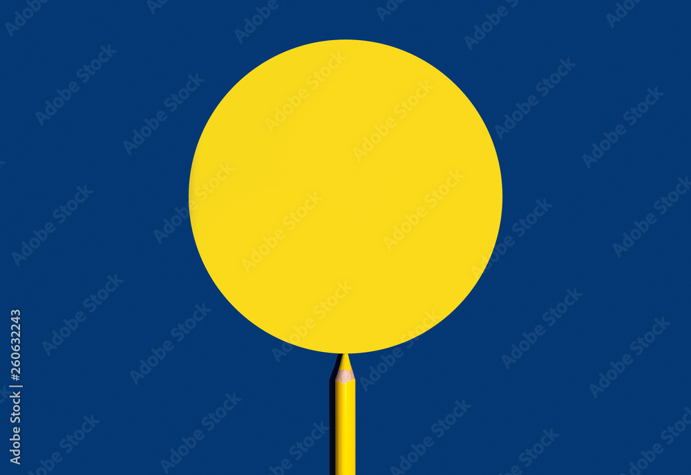 Yellow pencil draw yellow circle shape for copy space on a blue ...