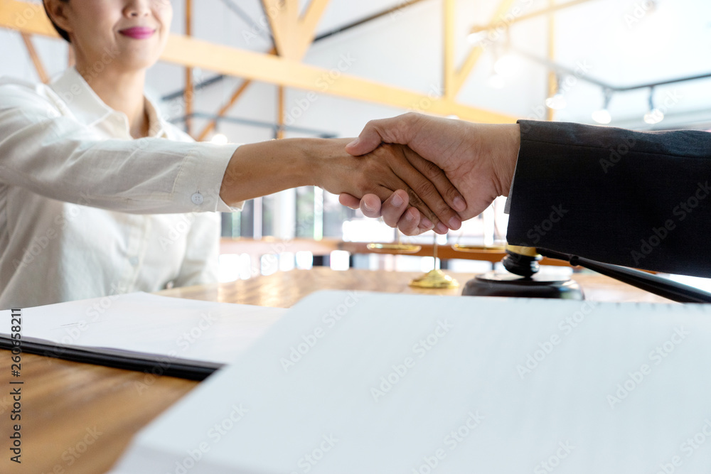 Lawyer or judge with gavel and balance handshake with client Stock ...
