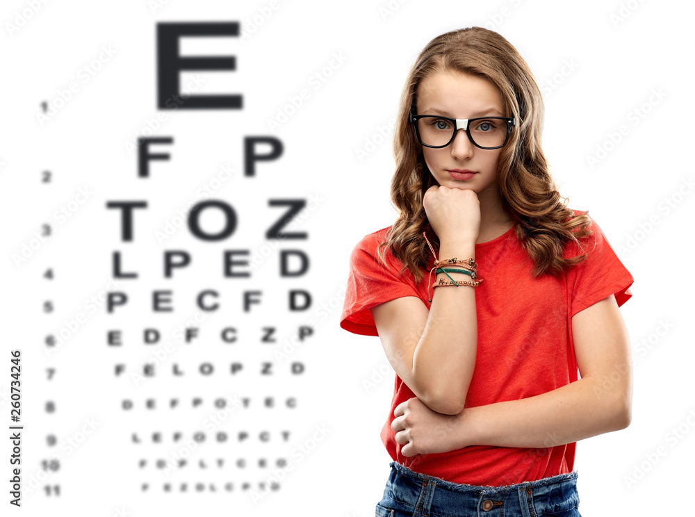 vision, eyesight and eyewear concept - teenage student girl in glasses ...